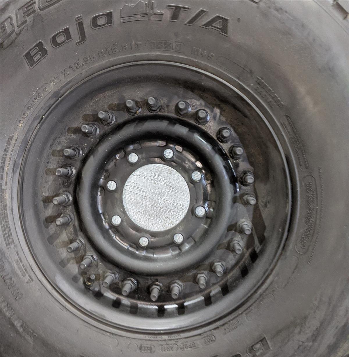 BF Goodrich Baja T/A 37X12.50R16.5LT Radial Tire Mounted on 24 Bolt Rim 100% Tread HMMWV